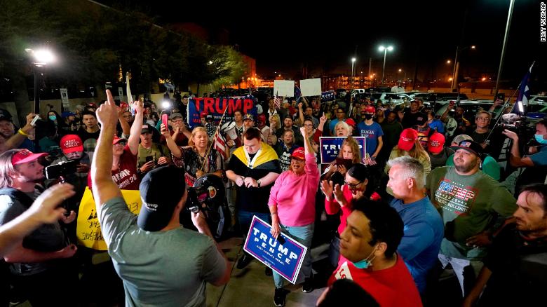 Demonstrators gather in cities and outside election offices amid ...