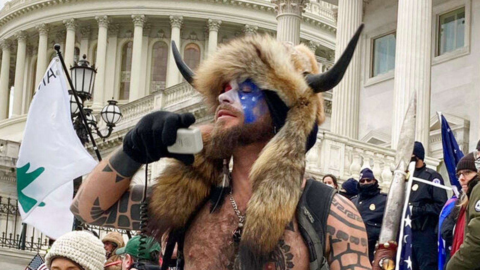 Trump supporter riots: Horn-wearing 'QAnon shaman' Jake Angeli arrested ...