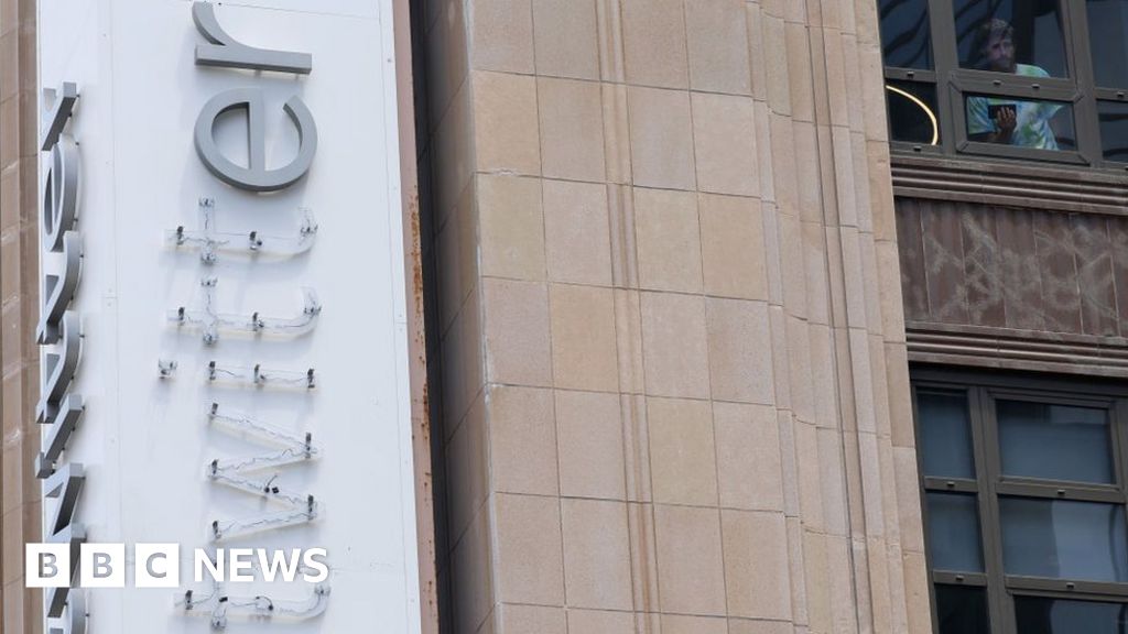 Twitter headquarters left with half a sign as police interrupt ...