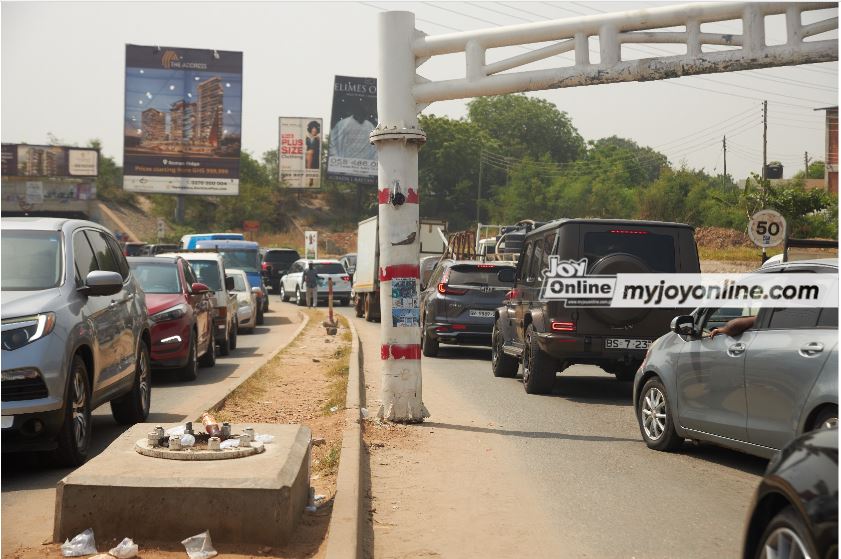 Broken height limit pole on East Legon Under-bridge stretch poses ...