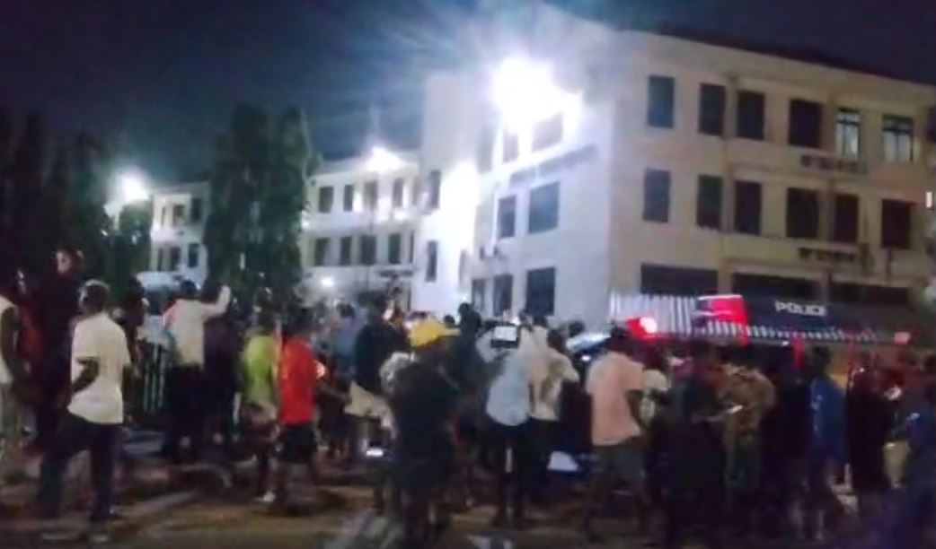 NPP supporters attack police pickup trucks at EOCO head office ...